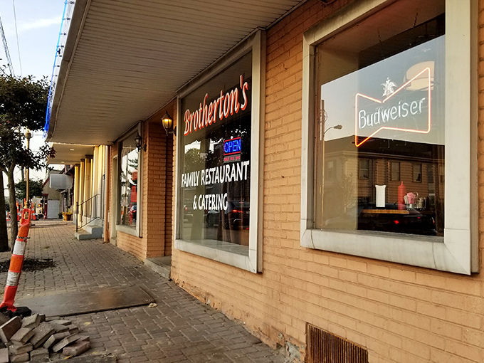 The neon glow of Brotherton's sign isn't just illumination—it's a beacon calling you home to Cincinnati comfort food paradise.