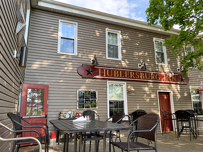 The unassuming exterior of Hublersburg Inn stands like a culinary speakeasy – no flashy signs needed when the food does all the talking.