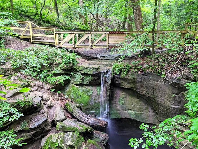 Nature's own staircase – this hidden waterfall and rustic footbridge create the perfect "am I still in Ohio?" moment that makes Mohican magical.