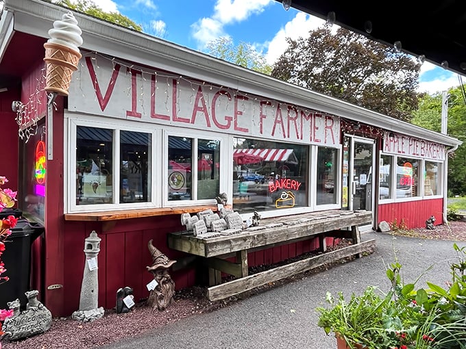 The red exterior of Village Farmer and Bakery stands like a delicious mirage in Delaware Water Gap, complete with an ice cream cone sign that's practically winking at you.