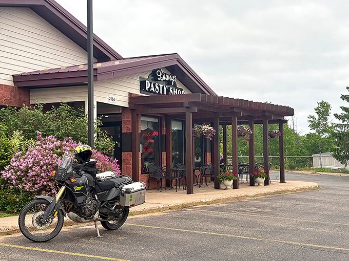 The unassuming exterior of Lawry's Pasty Shop stands like a culinary lighthouse, beckoning hungry travelers with the promise of Upper Peninsula comfort food perfection. 