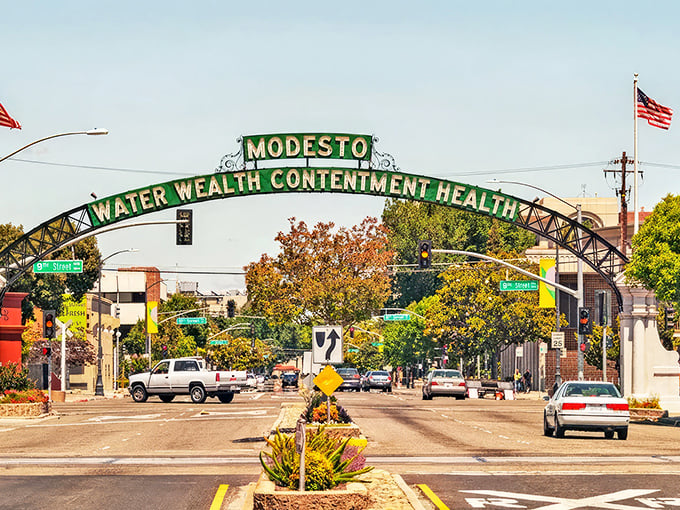 Modesto's iconic arch welcomes you with a promise that feels refreshingly honest in today's world: "Water Wealth Contentment Health." No false advertising here!