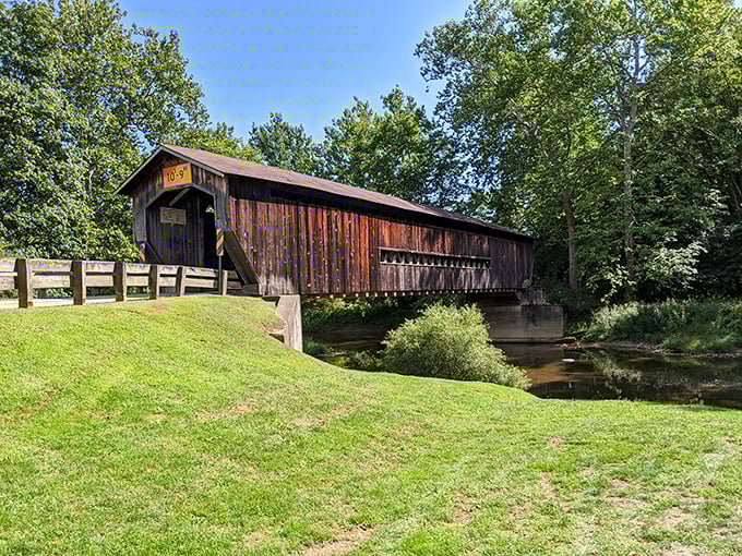 This weathered beauty spans 139 feet like a wooden time machine waiting for your visit.
