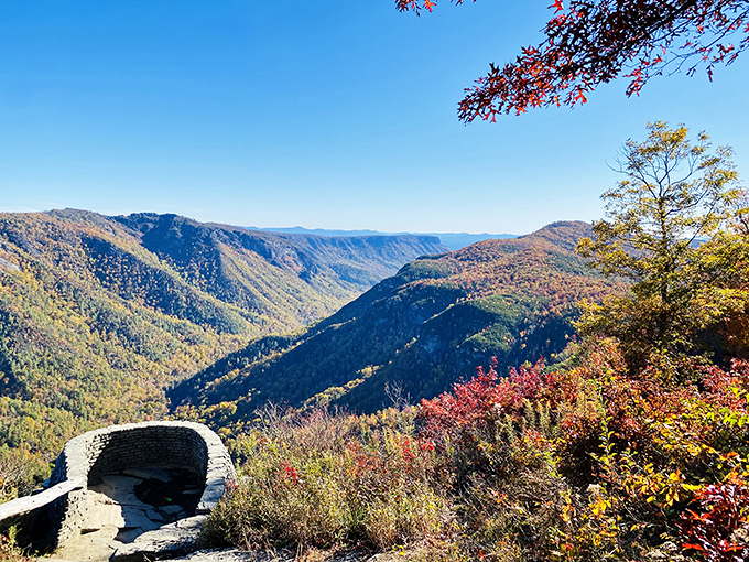 Nature's grand theater unfolds at Wiseman's View, where the Linville Gorge stretches before you like a living landscape painting.