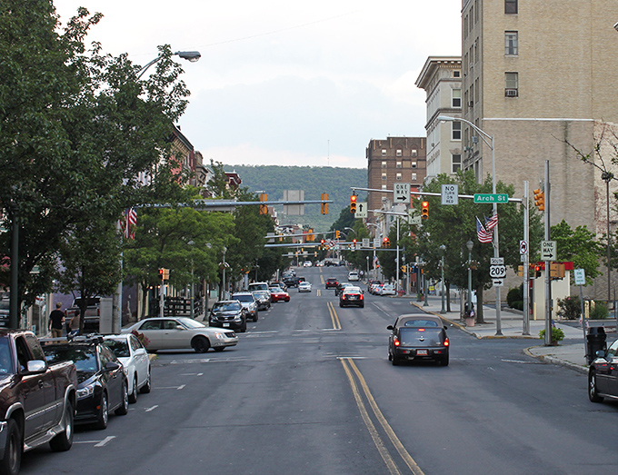Downtown Pottsville stretches before you like a living postcard, where historic brick buildings stand sentinel against the backdrop of Pennsylvania's rolling hills.