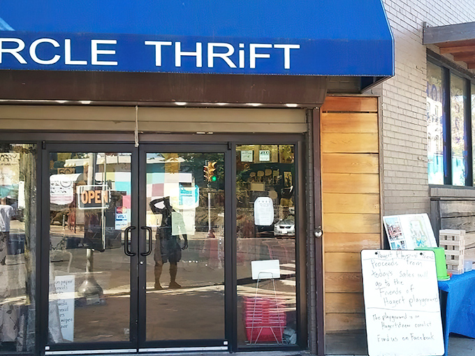 The blue awning beckons like a portal to bargain paradise. Circle Thrift's vibrant storefront stands out in Philadelphia's urban landscape, promising treasures within.