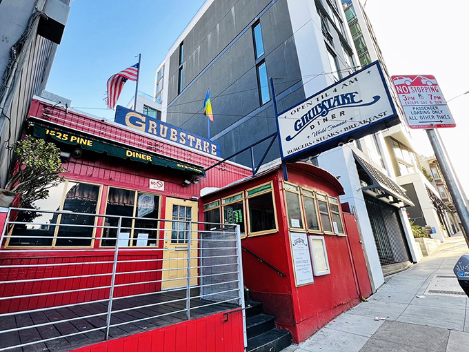 The iconic red exterior of Grubstake Diner stands out like a beacon for hungry night owls, promising Portuguese-American comfort food until the wee hours.