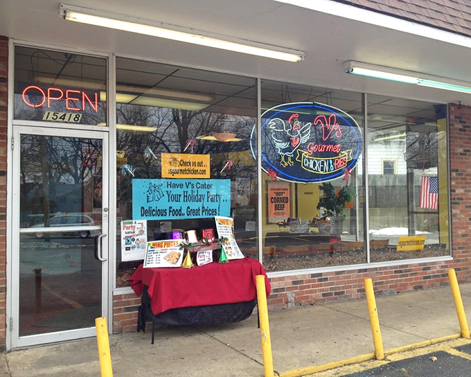 The unassuming storefront of V's Gourmet Chicken might not stop traffic, but trust me—your taste buds will slam on the brakes once you're inside.