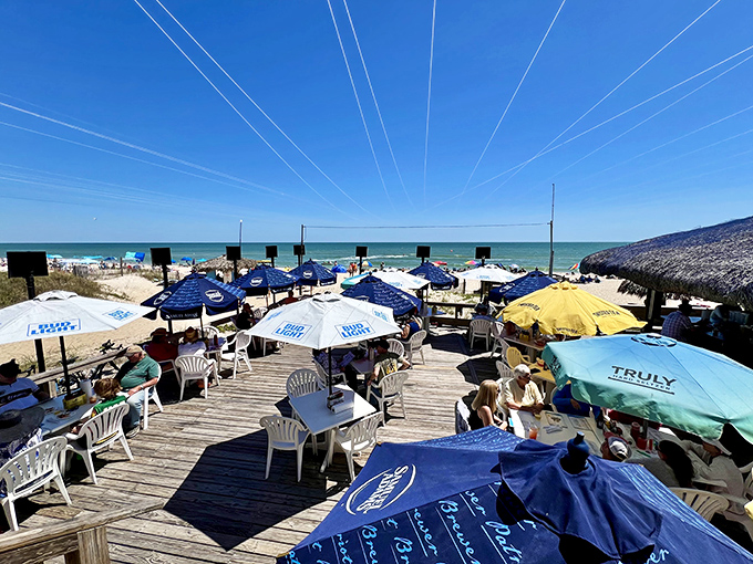 Paradise found! The Blue Parrot's beachfront deck offers diners a front-row seat to nature's greatest show—the Gulf of Mexico in all its glory.