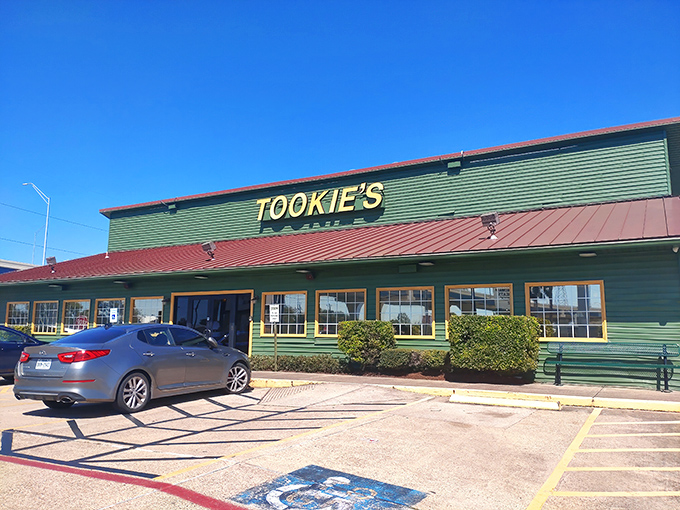 Tookie's neon sign glows like a lighthouse for hungry travelers, beckoning with the promise of comfort food that transcends the ordinary roadside experience.