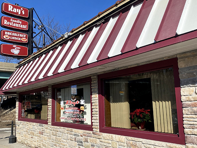 The red and white striped awning of Ray's isn't just eye-catching—it's a beacon of breakfast hope for hungry Elgin residents seeking comfort food salvation.