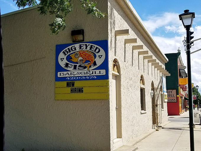 The unassuming exterior belies culinary greatness within—like finding Shakespeare performing in a gas station. That iconic fish logo promises delicious things to come.