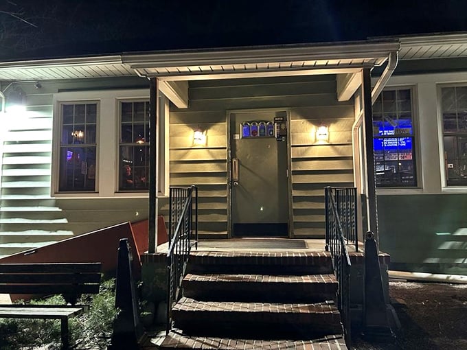 The unassuming exterior of The Pines Tavern proves once again that culinary treasures often hide in plain sight, nestled under mature trees on a quiet Bristol street.