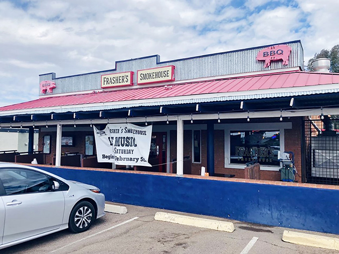 The unassuming red-roofed building with its simple signage is like a barbecue speakeasy – those in the know come flocking for smoky treasures inside.