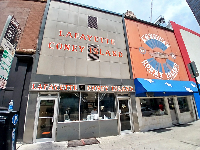 The iconic facade of Lafayette Coney Island stands proudly next to its longtime rival, American Coney Island. Detroit's greatest food rivalry continues daily on this downtown corner.