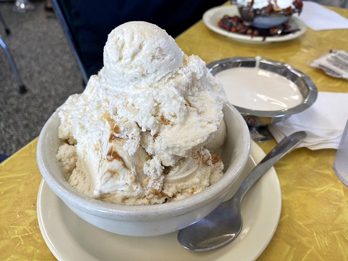 This apple cobbler sundae with its crown of cashews isn't just dessert—it's what apple pie dreams of becoming when it grows up.