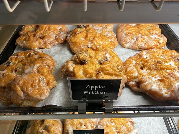 Apple fritters that could make a French pastry chef weep with joy. Crispy, glazed exterior giving way to tender, apple-studded interior—pure poetry.