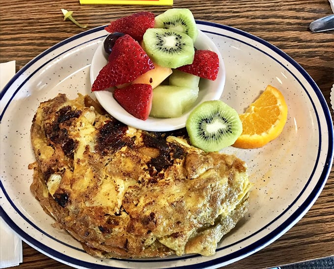 An omelet that whispers "California" with every bite. Fresh ingredients folded into fluffy eggs—simple math that equals pure satisfaction.