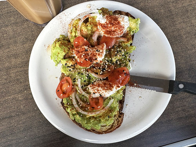 Avocado toast that's worth every penny of your down payment. This isn't just breakfast—it's edible California real estate.