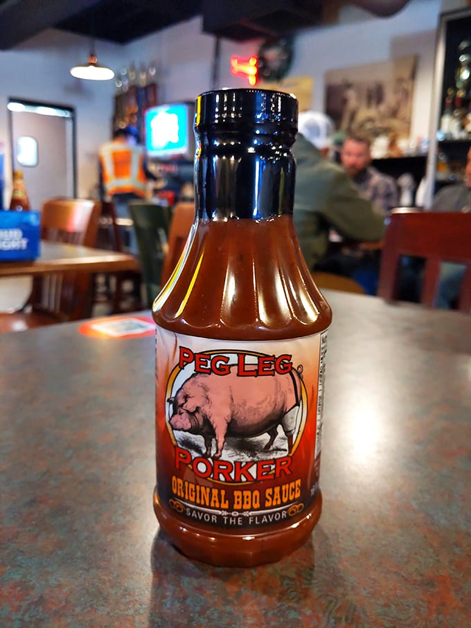 Their house sauce—not too sweet, not too tangy—stands ready to enhance, not hide, the smoke-kissed meat that's already a masterpiece.
