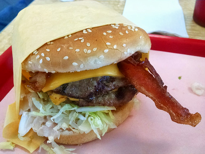 The bacon cheeseburger—where beef, pork, and dairy unite in a flavor alliance that would make world leaders jealous. Worth every napkin.