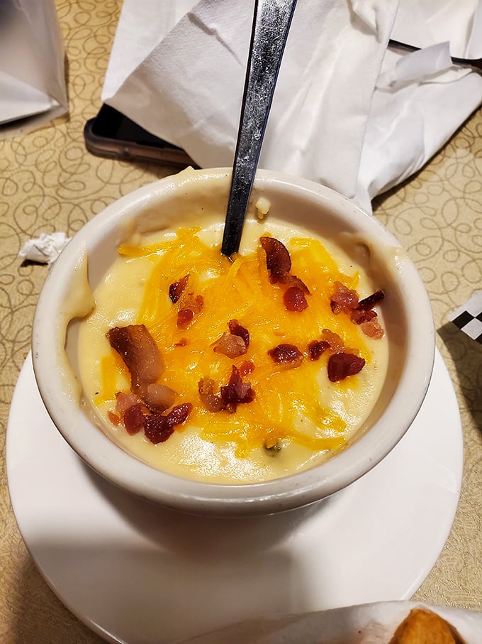 This loaded baked potato with bacon and cheese is what comfort food dreams are made of – a side dish that refuses to be upstaged by the main attraction.