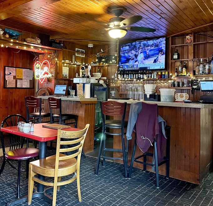 The bar area – where solo diners become regulars and strangers become friends over cold beers and hot pizza.
