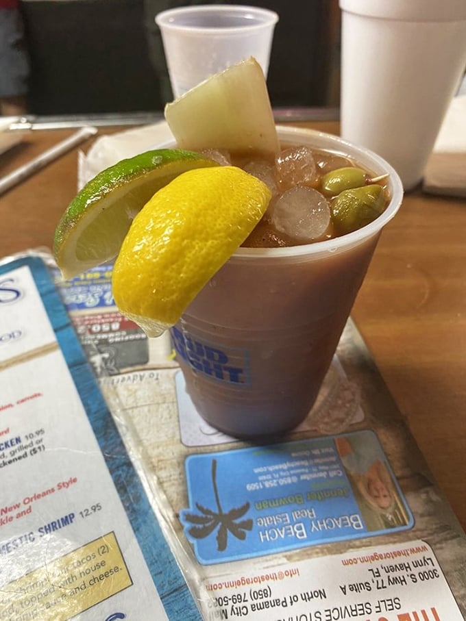 A proper Bloody Mary at Hunt's—where the garnish isn't some ridiculous food tower, just the essentials for enhancing your seafood feast.
