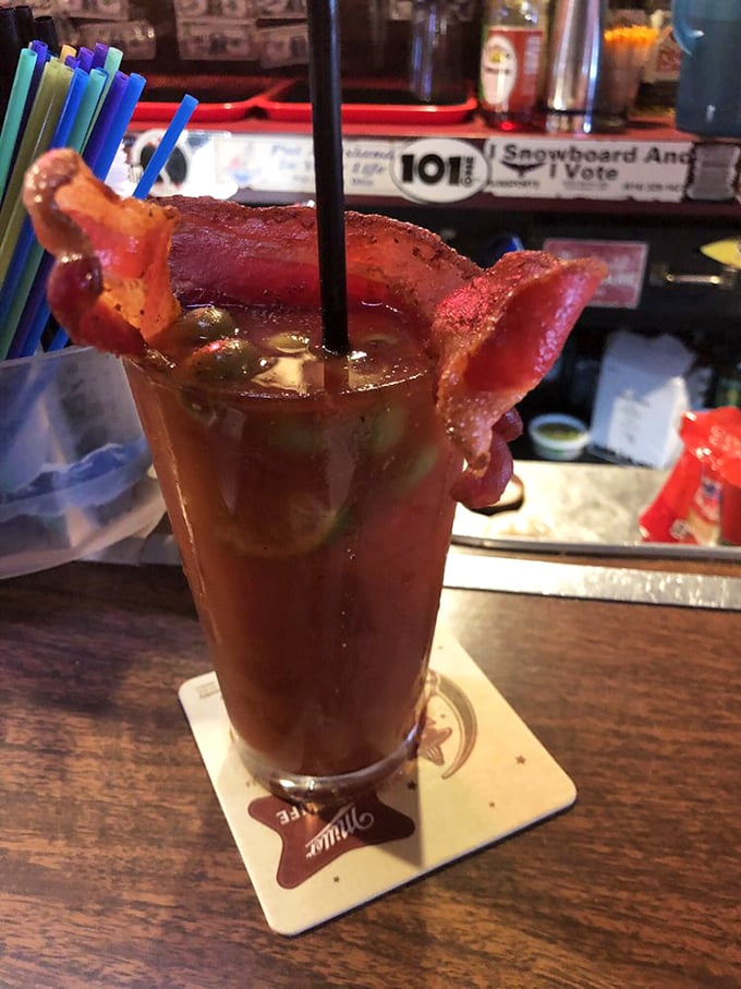 Their Bloody Mary doesn't just come with a bacon garnish—it arrives with what appears to be half a pig's worth. Breakfast and cocktail in one glass.