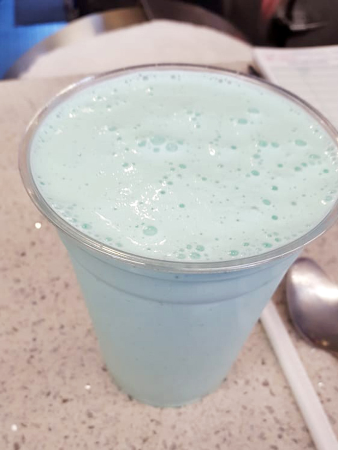 That blue raspberry shake isn't just a drink—it's a childhood memory in a cup, complete with the promise of a blue tongue.