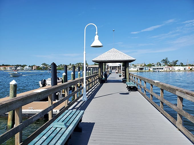 This boardwalk doesn't need carnival games or cotton candy. The simple wooden path carries you over water so blue it seems artificially enhanced.