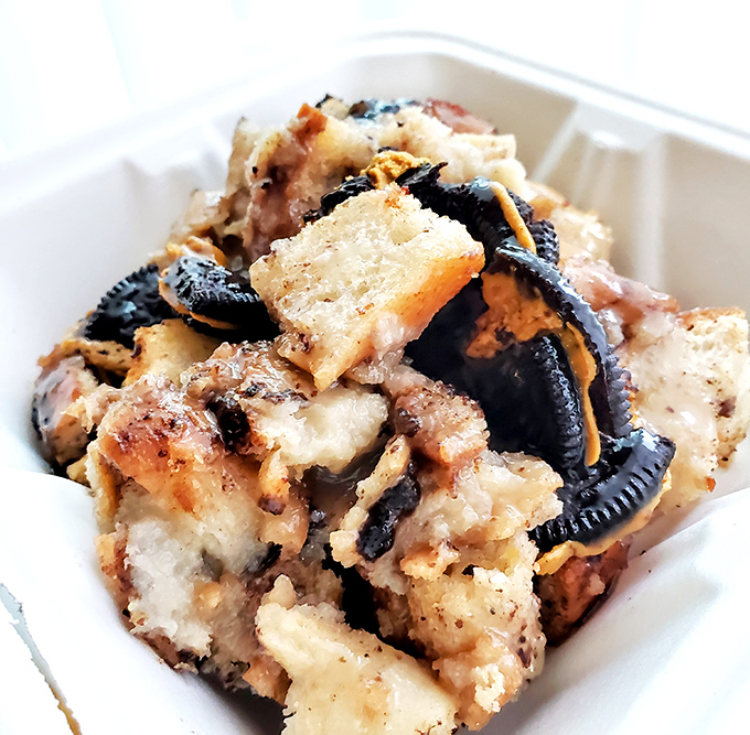 This isn't merely bread pudding—it's a sweet conspiracy of custard-soaked bread and cookies that makes diets disappear.