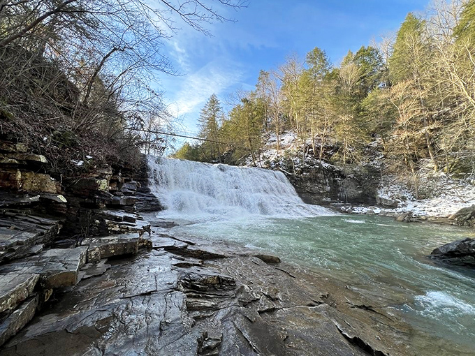 Winter transforms Cane Creek Falls into nature's snow cone machine, where icy cascades create a scene worth every shiver and slippery step.