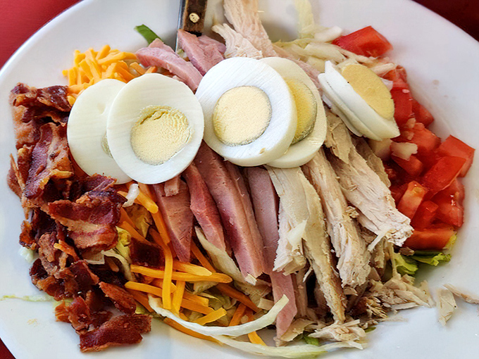 A chef salad that makes eating vegetables feel like cheating on your diet—protein, color, and satisfaction in every forkful.