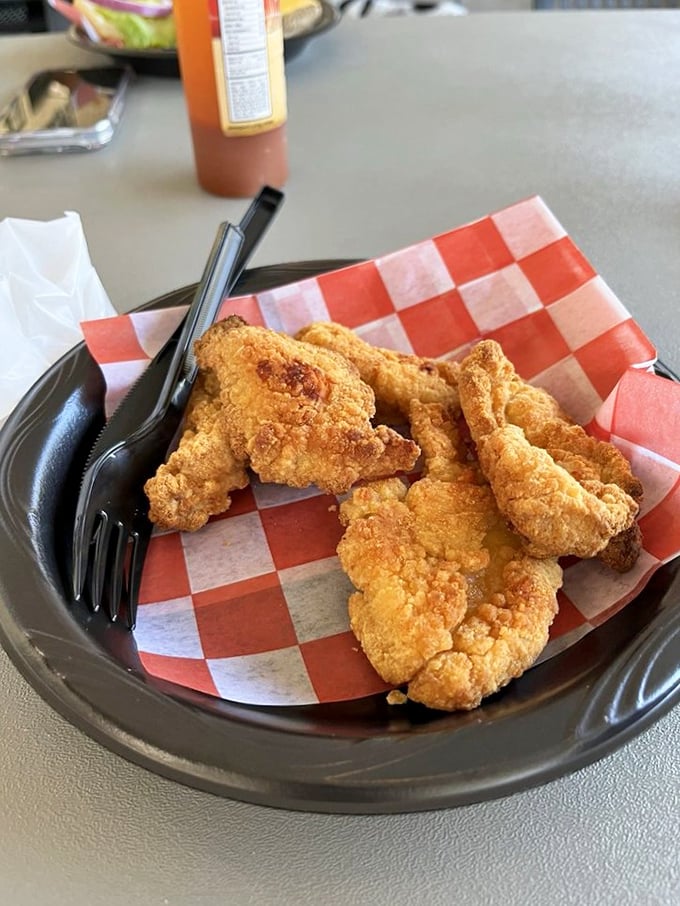 Even the chicken tenders achieve golden-brown perfection – proof that this kitchen respects everything it touches, not just creatures from the sea.