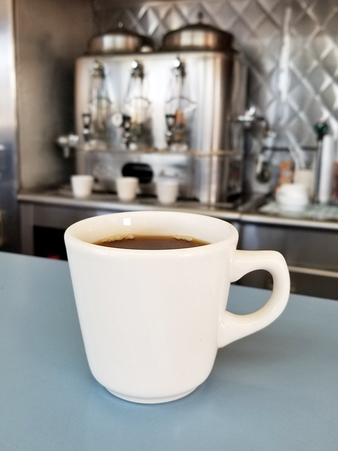 Coffee served in a mug that means business – no foam art, no fancy names, just the fuel that built Detroit.