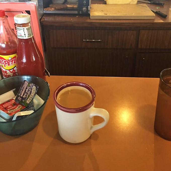 The diner coffee mug—arguably America's most important vessel, delivering life-giving caffeine with no-nonsense efficiency.