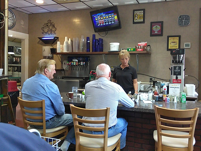 The counter—where solo diners become regulars and regulars become family. Watch the short-order ballet while getting the unfiltered pulse of Milford from those swivel seats.