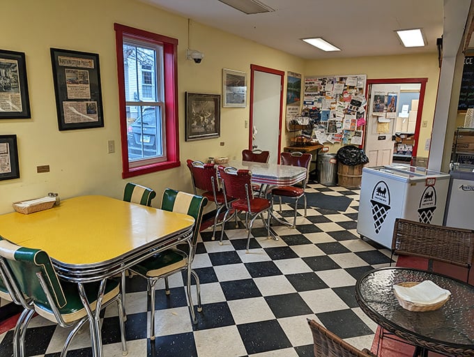 The retro dining area doesn't just offer seating—it offers a time portal. Those checkerboard floors have witnessed more local gossip than a church picnic.