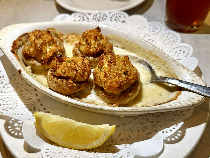 These stuffed mushrooms aren't just appetizers—they're little boats of crabby goodness sailing on a sea of butter and herbs.