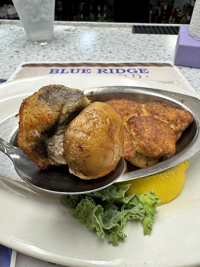 Stuffed mushrooms and crab cake—a plate that whispers "Virginia knows seafood" with every savory, butter-kissed bite.