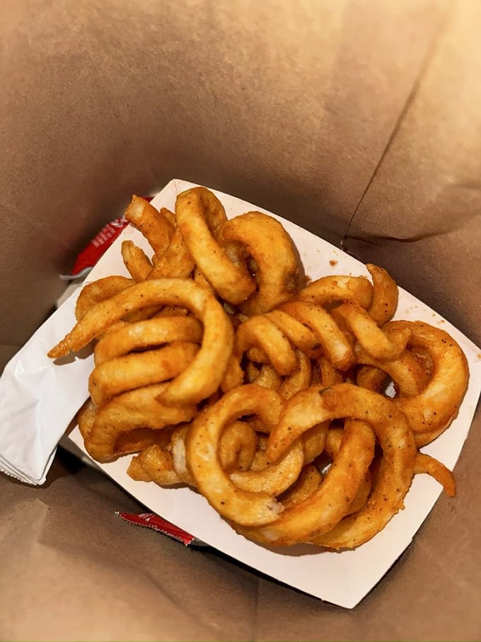 These curly fries are like the jazz musicians of the fried potato world—they improvise their way into your heart.