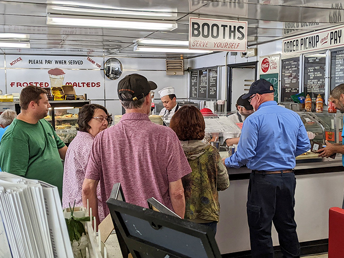 The lunch rush isn't just about eating—it's a community ritual. These folks aren't customers; they're the living, breathing soul of small-town America.