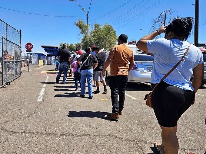 The morning pilgrimage begins as shoppers line up, united by the universal religion of finding treasures at prices worth bragging about.