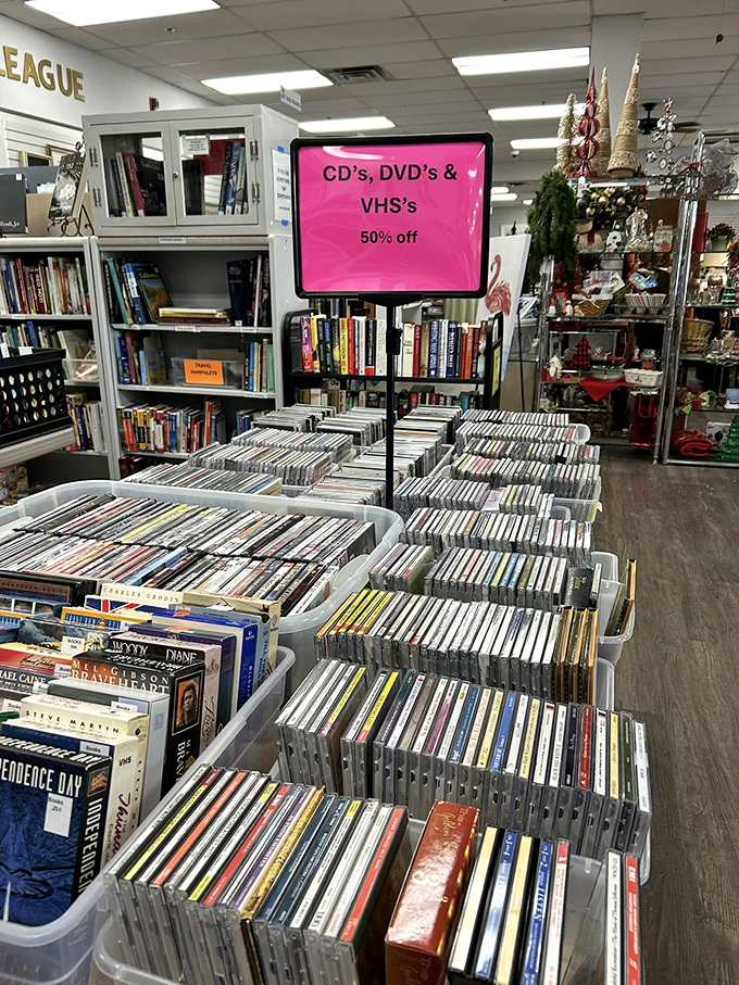 Remember when entertainment required physical media? This nostalgic treasure trove of CDs and DVDs is a time capsule of pre-streaming life.