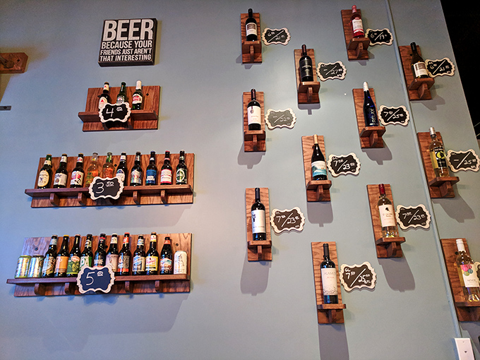 The wall displays aren't from some corporate design catalog—they're a love letter to beer enthusiasts who appreciate options.
