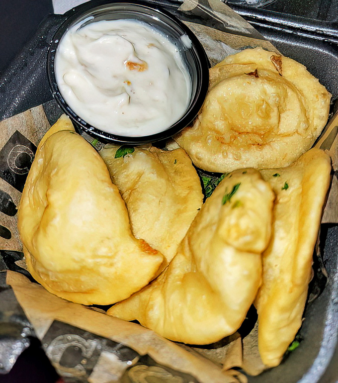 Pierogies get the deep-fried treatment, emerging golden and glorious—Eastern European comfort food with an American State Fair makeover.