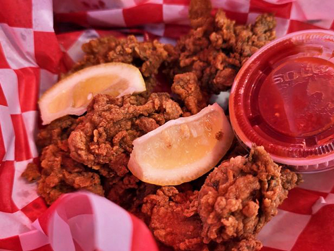 These aren't just fried oysters—they're golden nuggets of the sea that make you wonder why you ever wasted time eating chicken nuggets.