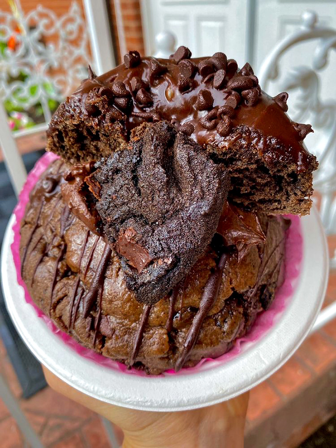 This chocolate bomb doesn't just satisfy cravings – it annihilates them. The brownie crown is like the dessert equivalent of a mic drop.