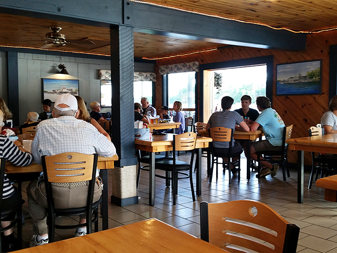 Where summer memories are made between bites of freshly caught fish, as wooden tables witness generations of families sharing Northwoods traditions.